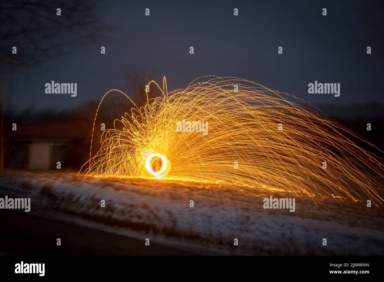 A beautiful vibrant gold circular wire wool at night Stock Photo - Alamy