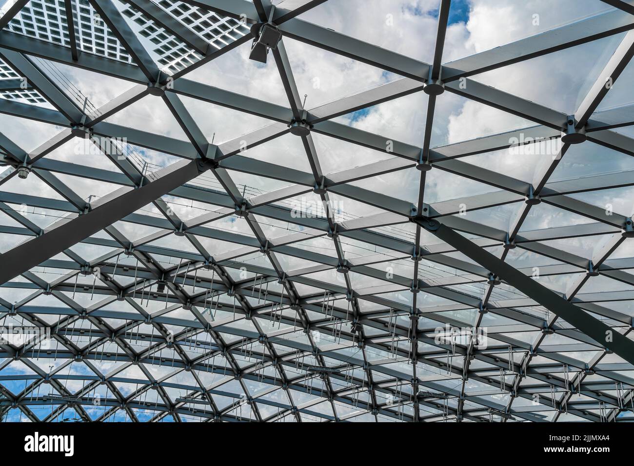 Glass metal framed roof of a modern building. Abstract architectural ...