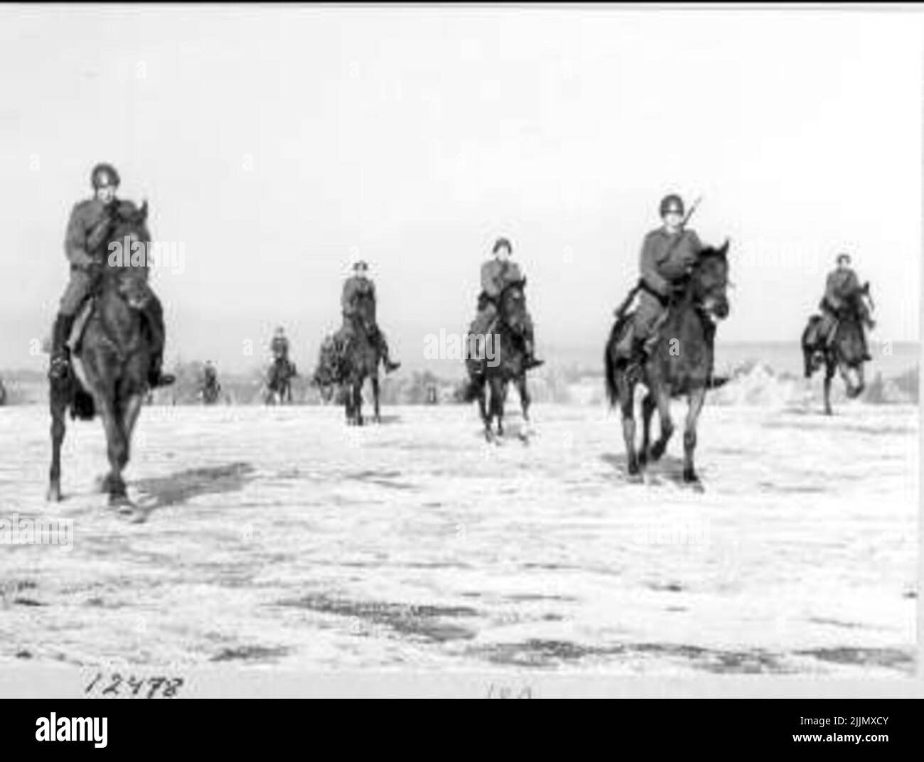 Equestrian Master Stig Aaby-Ericsson on "Handy" accompanied by Squadron ...