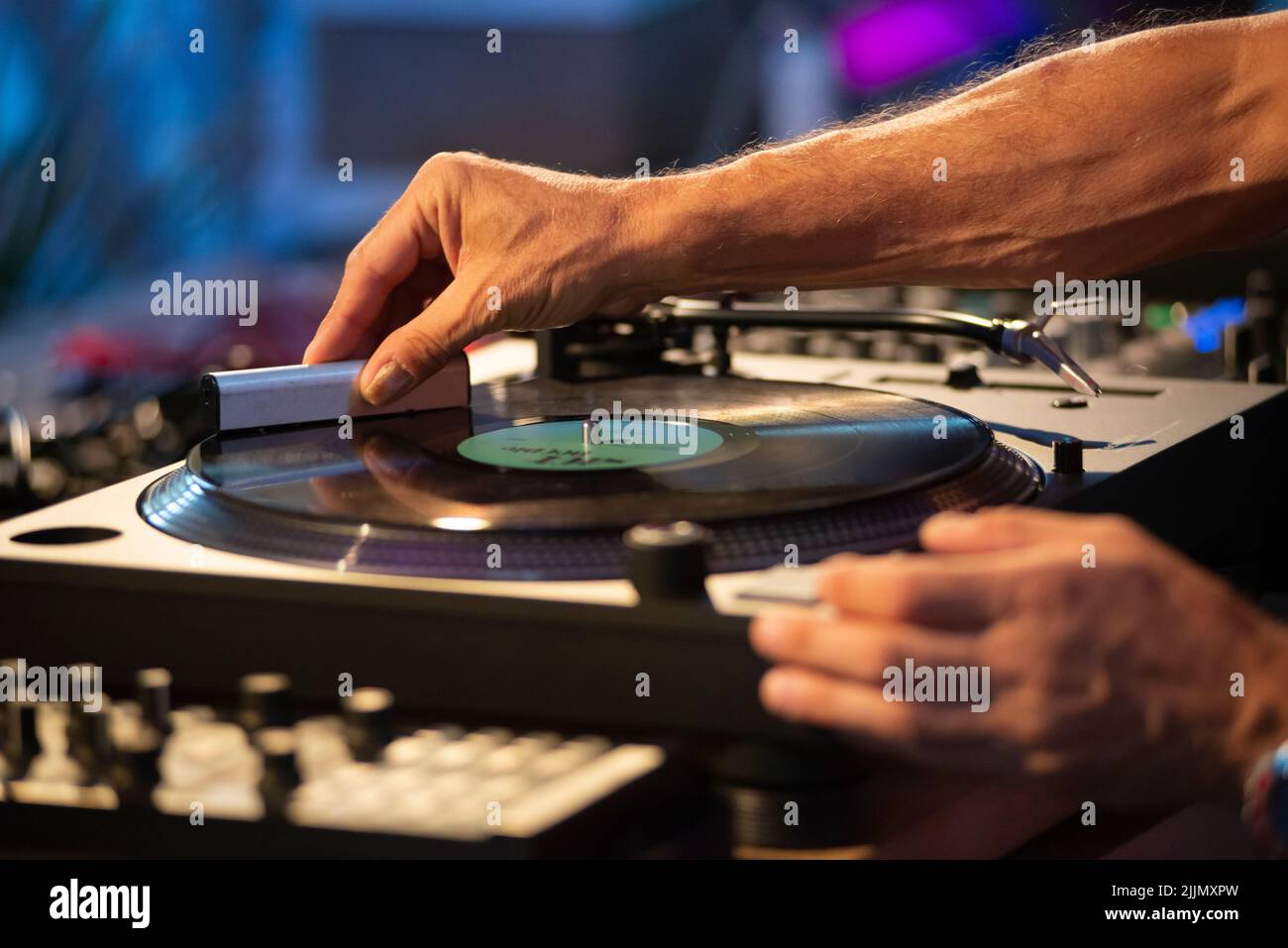 DJ Cleaning Vinyl Record Stock Photo - Alamy