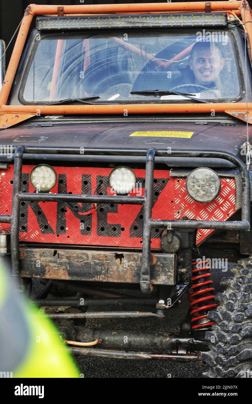 A vertical shot of a heavily modified Lada Niva for purposes of ...