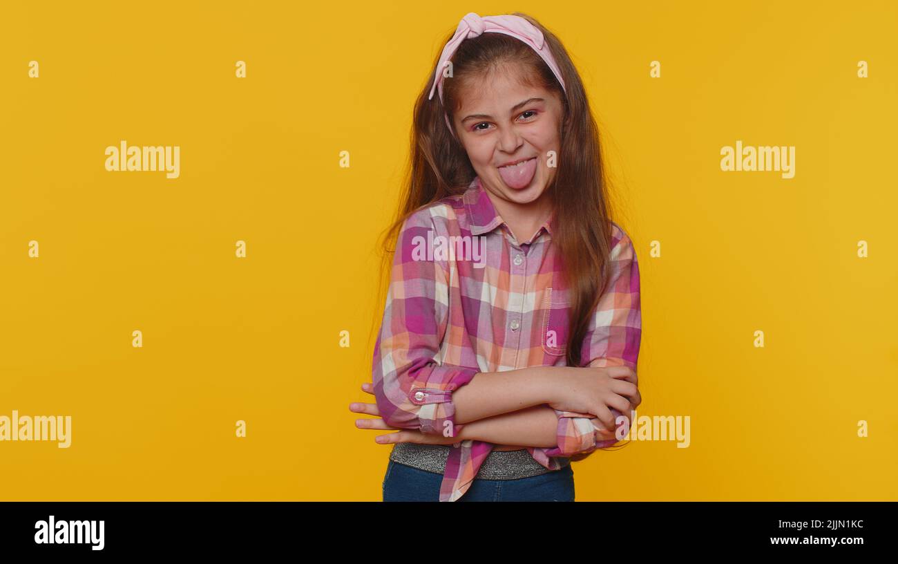 Happy joyful young preteen child girl kid making playful silly facial ...