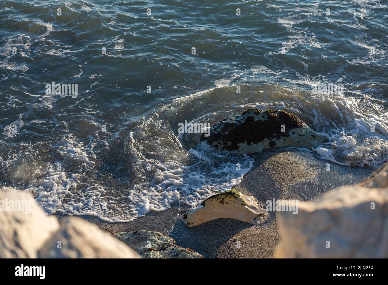 Closeup sunset sea waves hi-res stock photography and images - Alamy