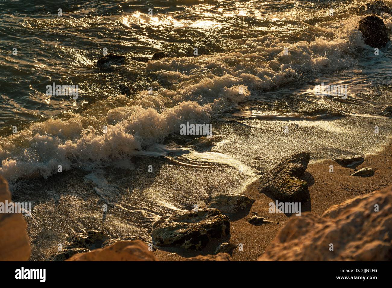 Closeup sunset sea waves hi-res stock photography and images - Alamy