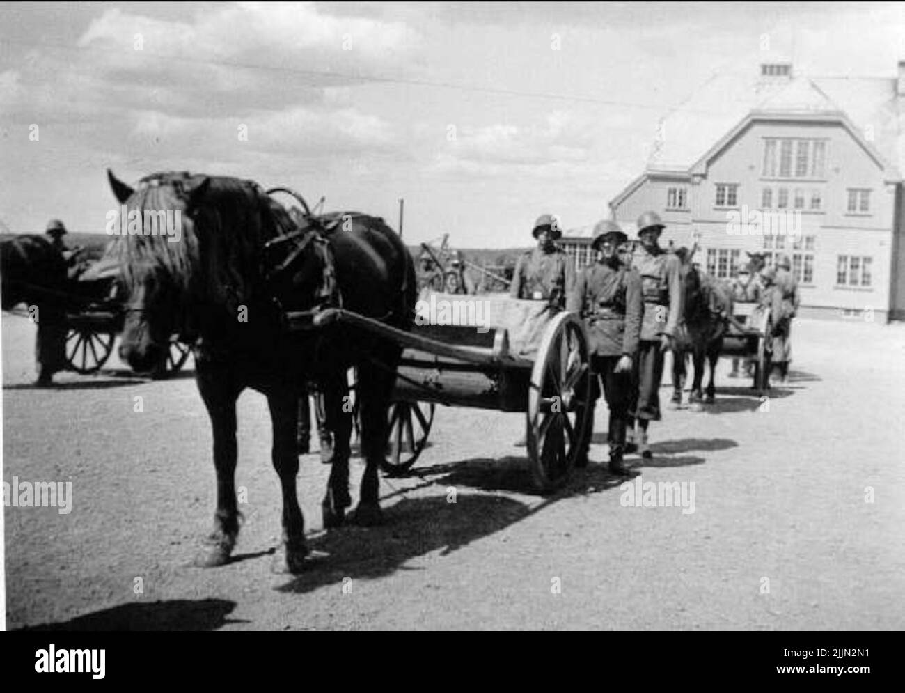 Military in field by horse and carriage Stock Photo - Alamy