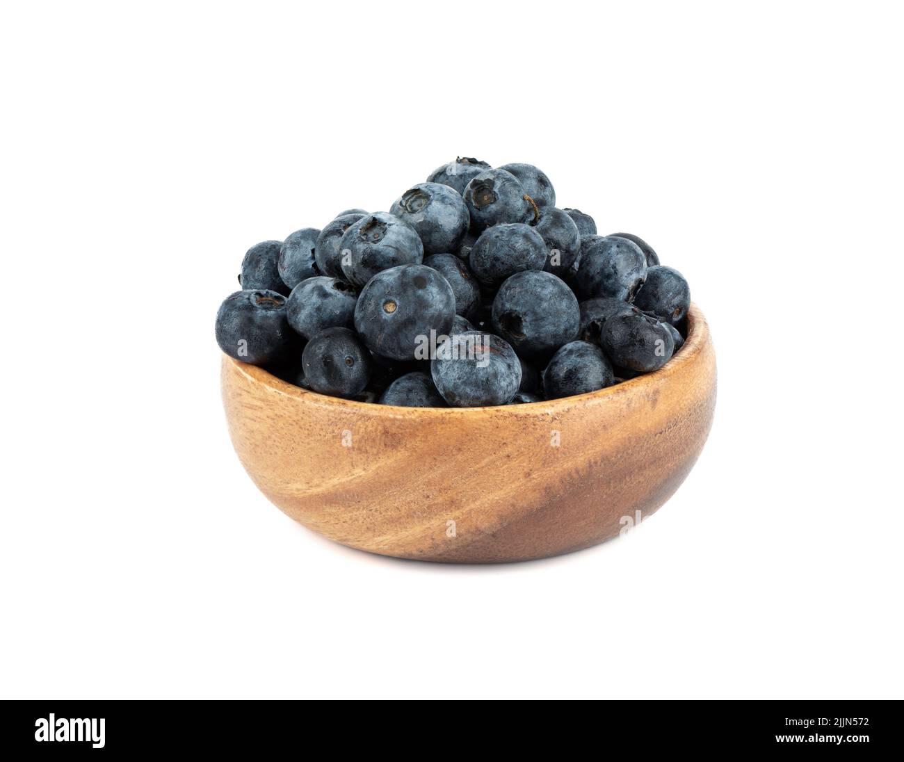 Wooden bowl full of blueberry or bilberry or whortleberry or ...