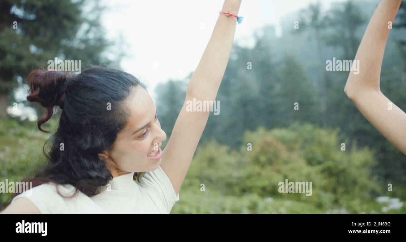 A closeup of girls in a forest in a daylight Stock Photo - Alamy