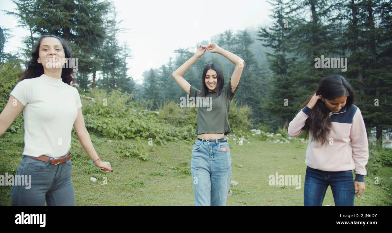 A closeup of girls in a forest in a daylight Stock Photo - Alamy