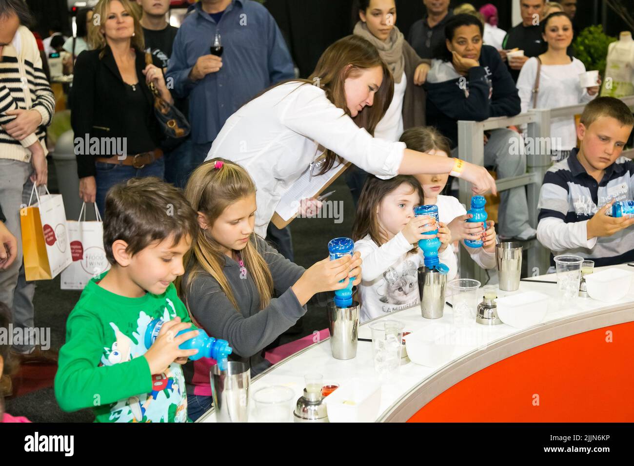 The kids interacting with exhibitors at the food and wine expo in ...