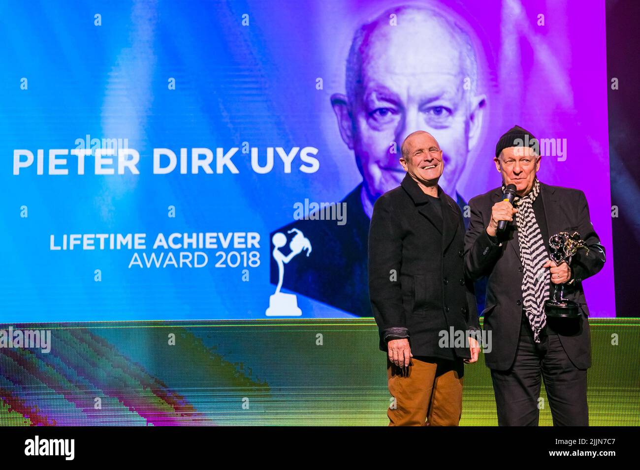 Pieter Dirk Uys receiving a lifetime achievement award from musical ...
