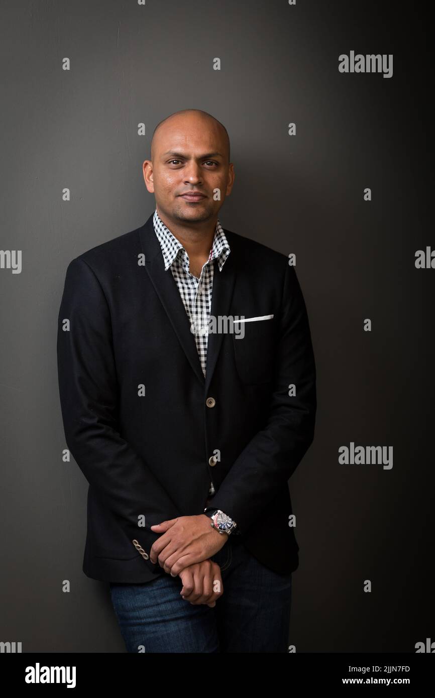 A vertical portrait of entrepreneur and businessman Preetesh Sweraj ...