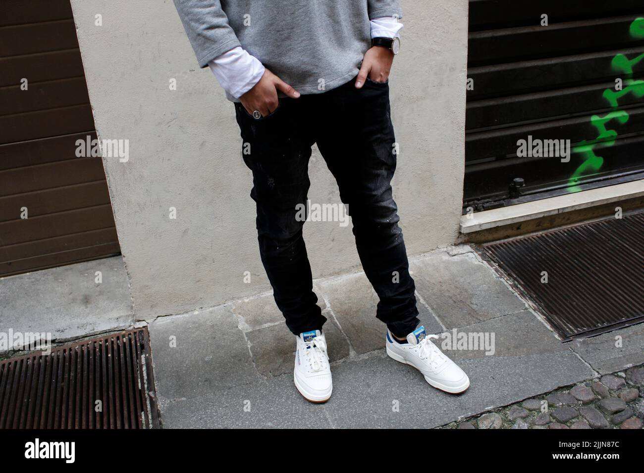A stylish young boy with hands in pockets Stock Photo - Alamy