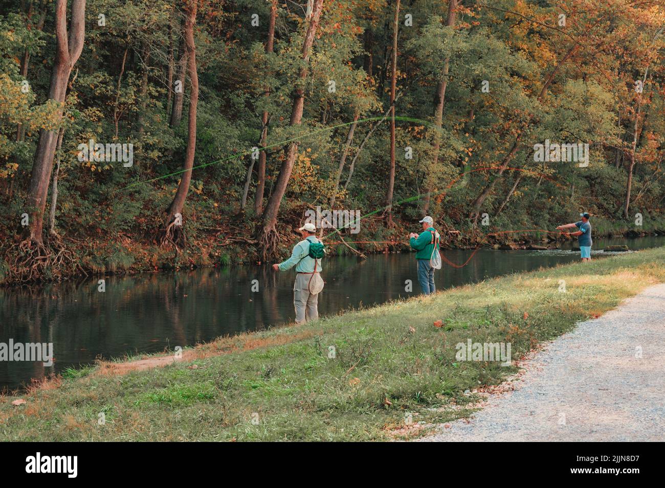 A beautiful shot of people Fly fishing on the river Stock Photo - Alamy