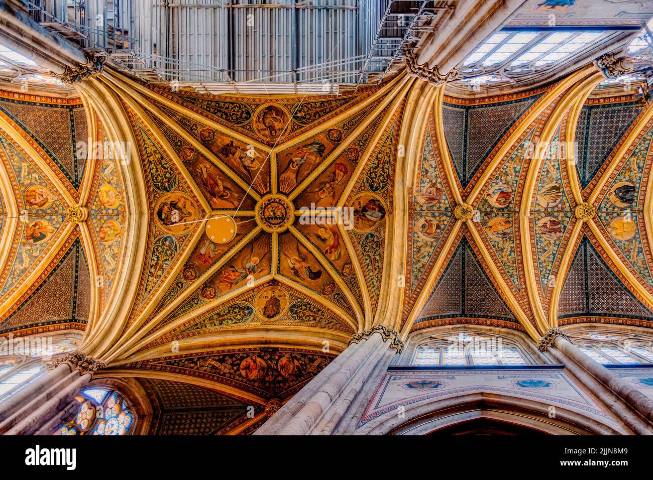 A low angle shot of the magnificent painted vaulted ceiling church ...