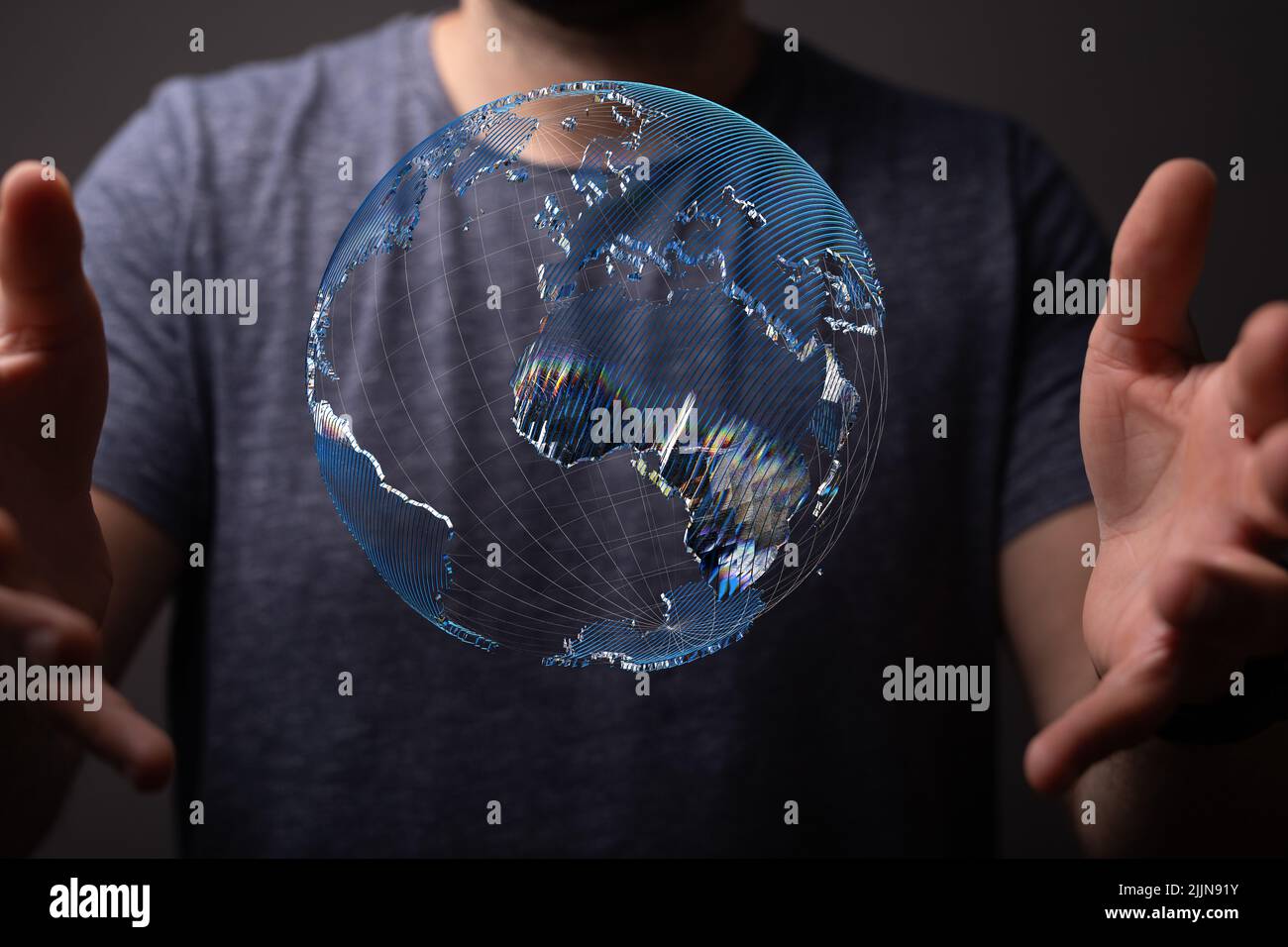 a photo of 3d rendered earth floating between man hands Stock Photo - Alamy