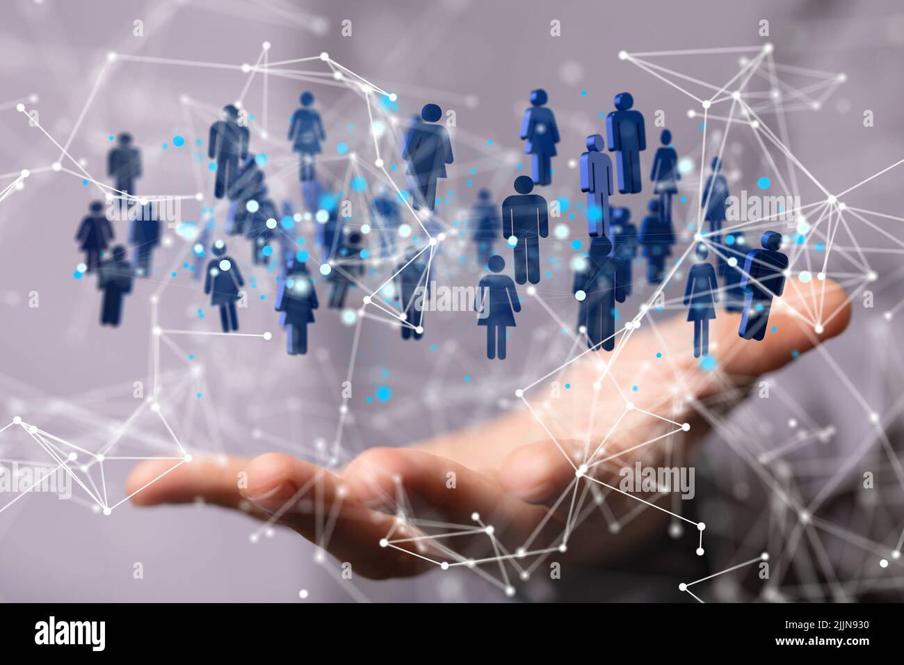 The 3d rendered people icons hovering over a man's hand Stock Photo - Alamy