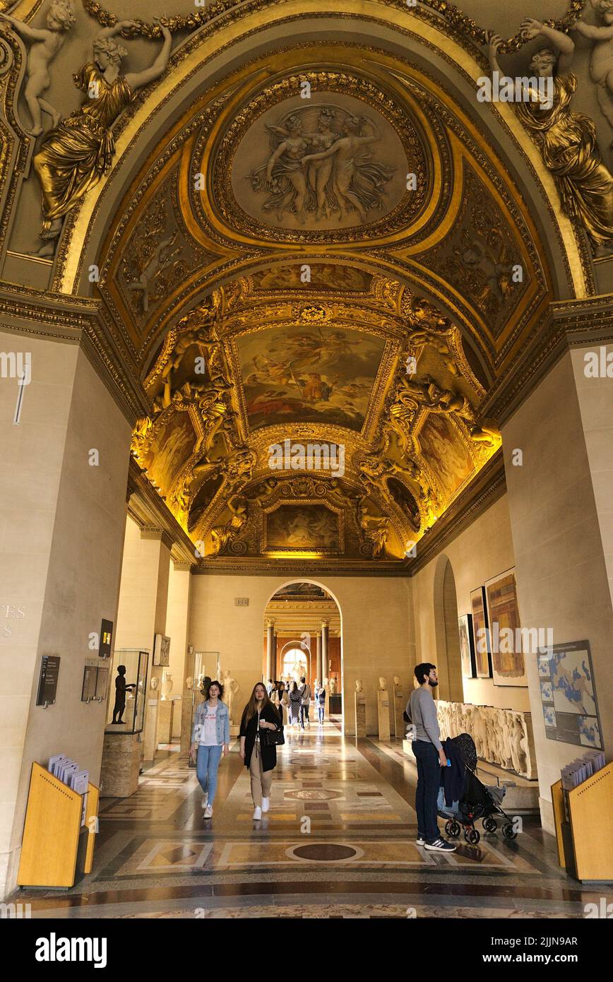 A vertical shot of the roof paintings and interior architecture of the ...
