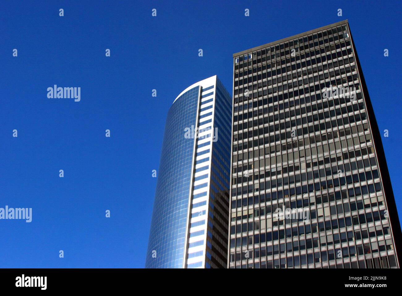 Two modern building at sunset hi-res stock photography and images - Alamy