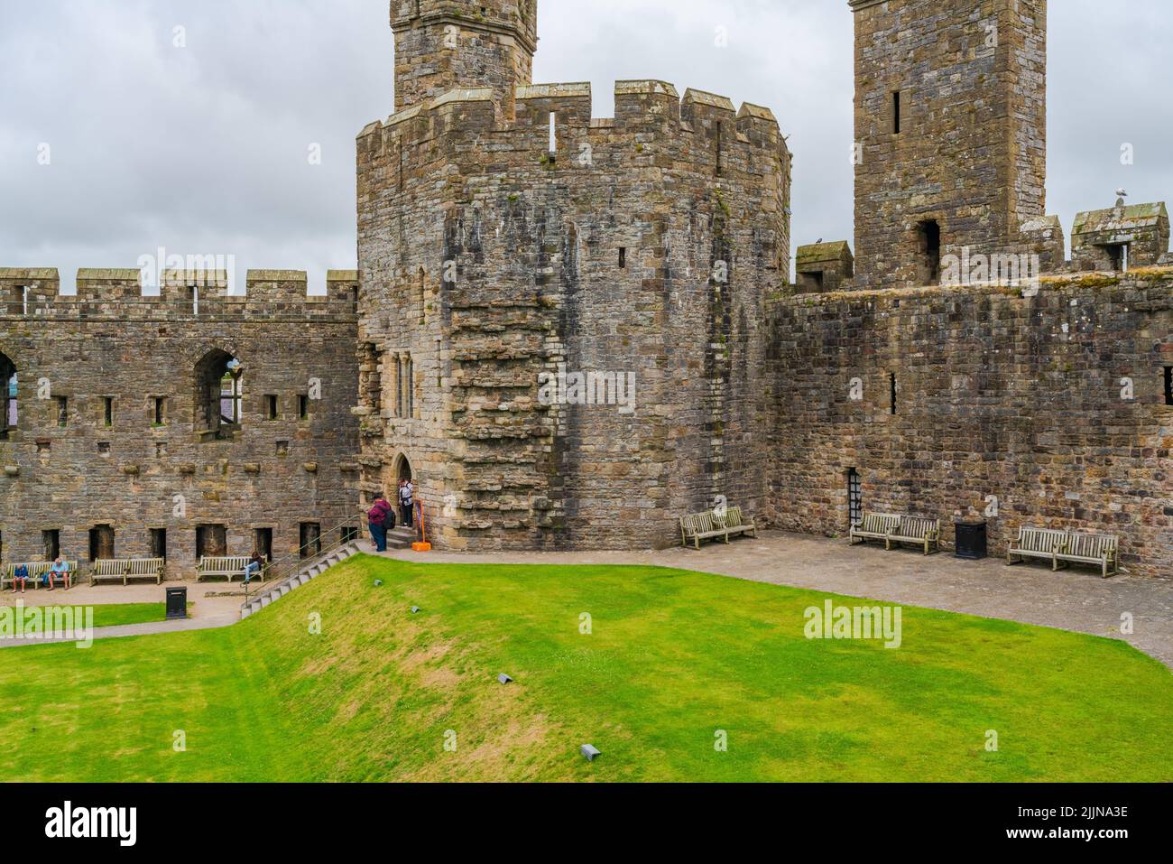 CAERNARFON, WALES - JULY 08, 2022: View of Caernarfon Castle ruins, a ...