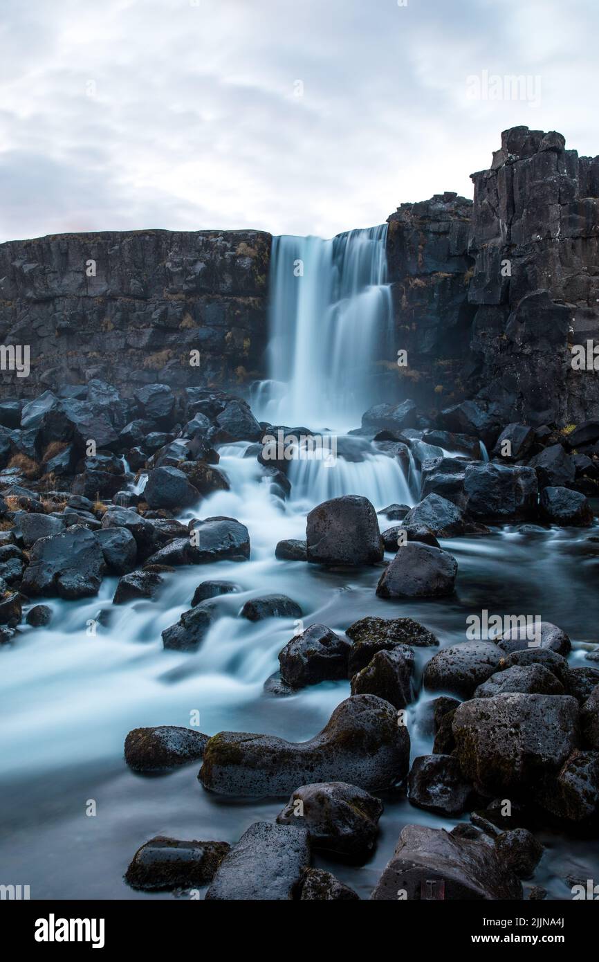 A vertical shot of waterfalls with long exposure Stock Photo - Alamy