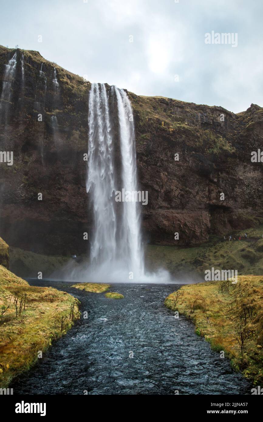 A vertical shot of Seljalandsfoss Waterfalls in Iceland Stock Photo - Alamy