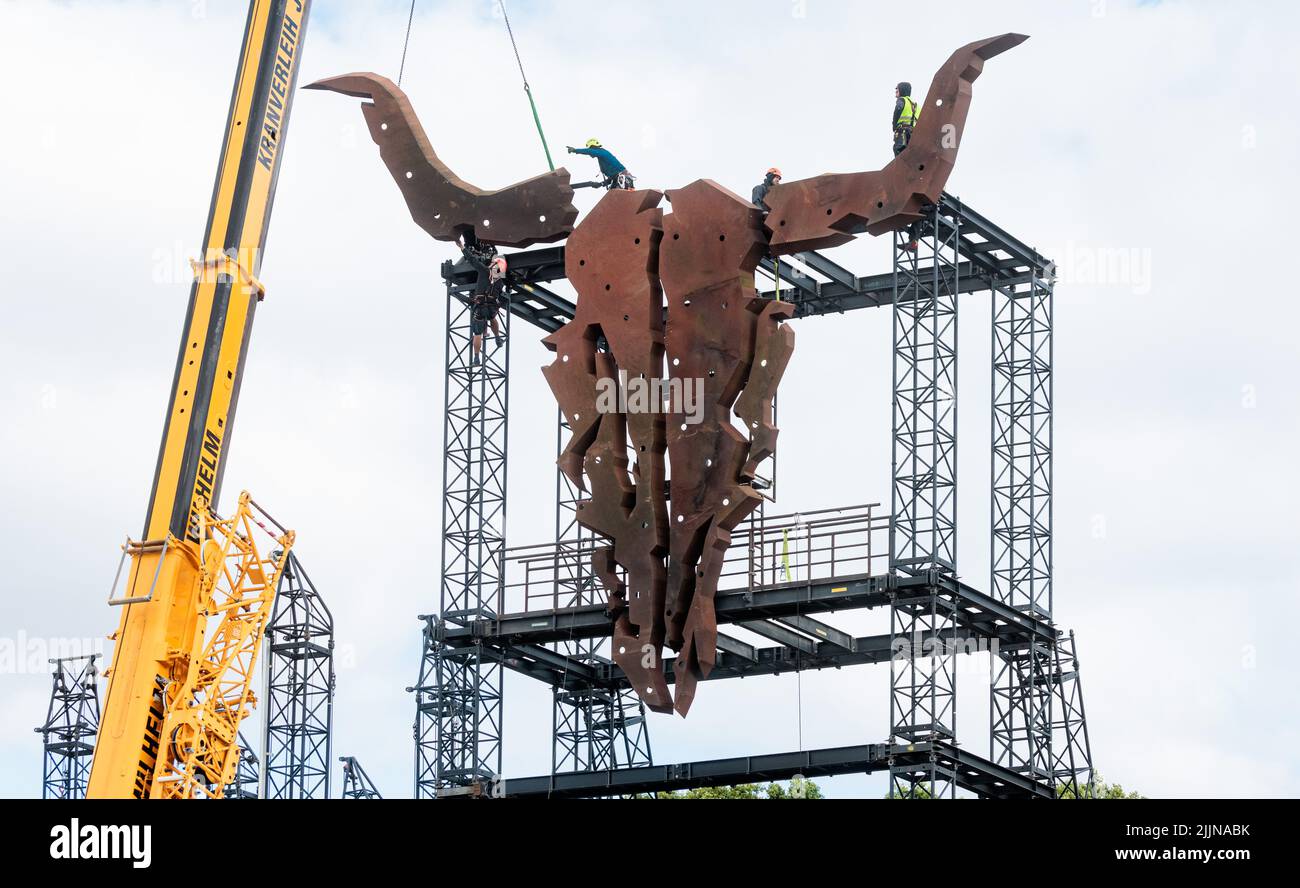 Wacken, Germany. 27th July, 2022. Workers assemble the Wacken Skull ...