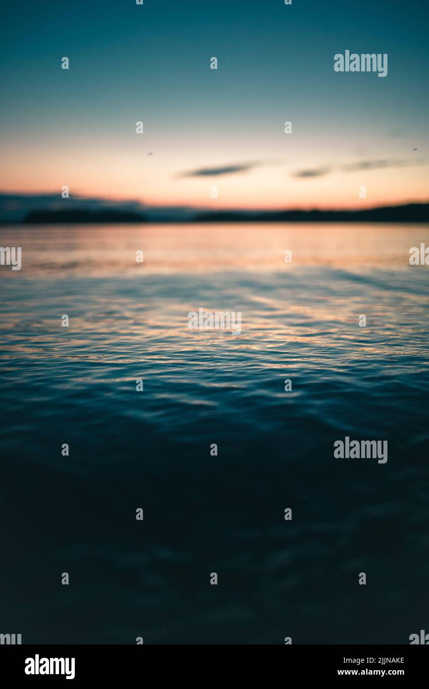 A beautiful landscape of dark deep water of the sea on the sunset Stock ...
