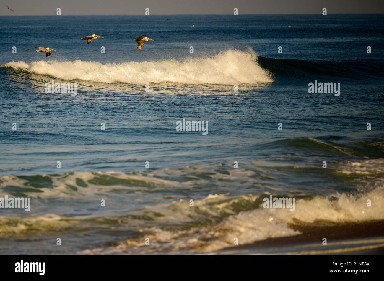 A natural landscape of the wavy sea at daylight Stock Photo - Alamy