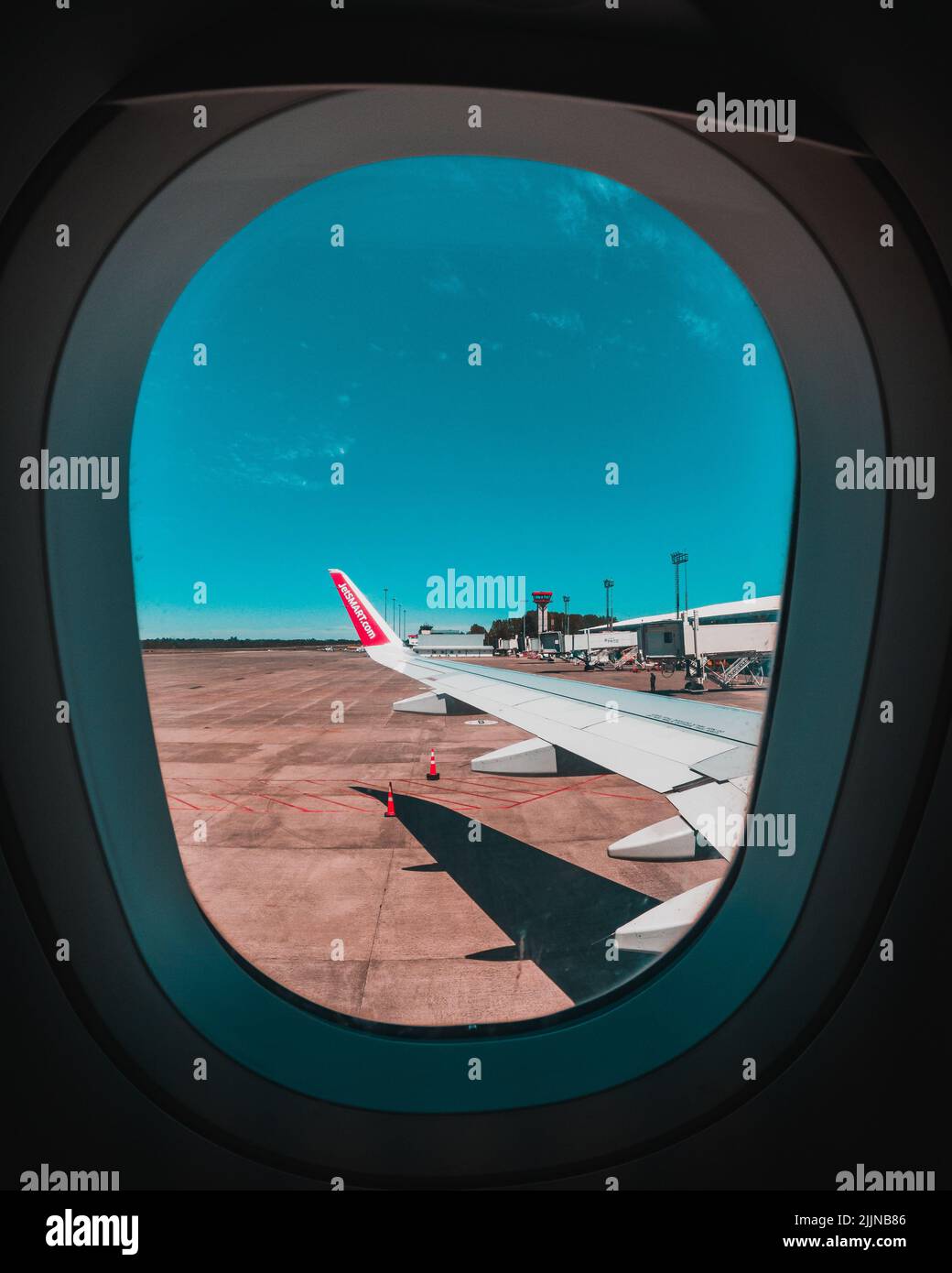 An airplane wing from its window Stock Photo - Alamy