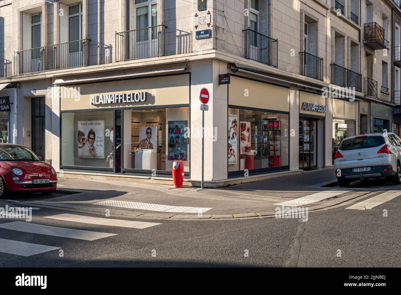 The Alain Afflelou optician front store facade view with logo and ...