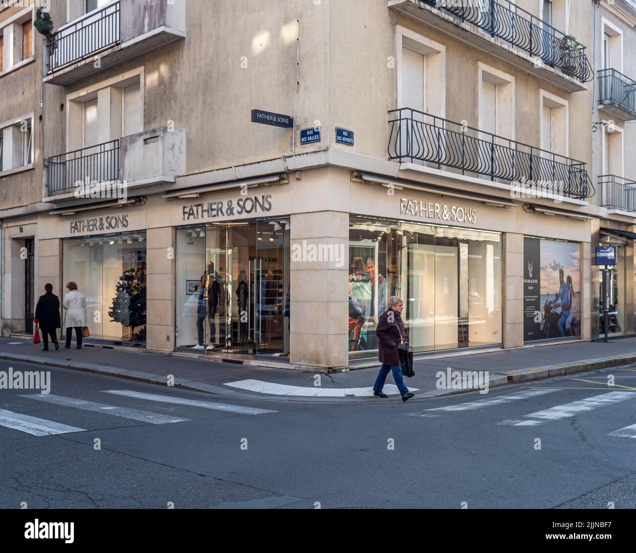 The Father and Sons store angled facade view with logo and signage ...