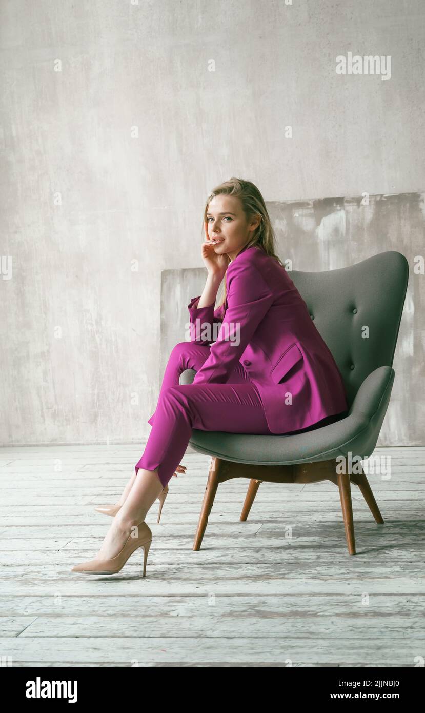 Pink suit hi-res stock photography and images - Alamy