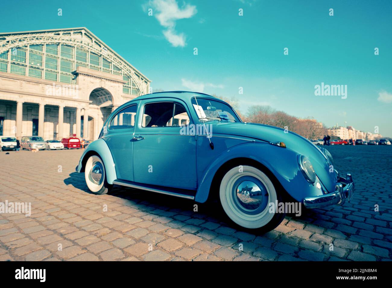 A beautiful retro blue Volkswagen Beetle car on the street in Brussels ...