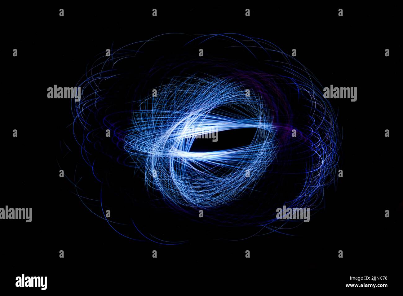 A digital render of abstract blue spiral lines on a black background ...