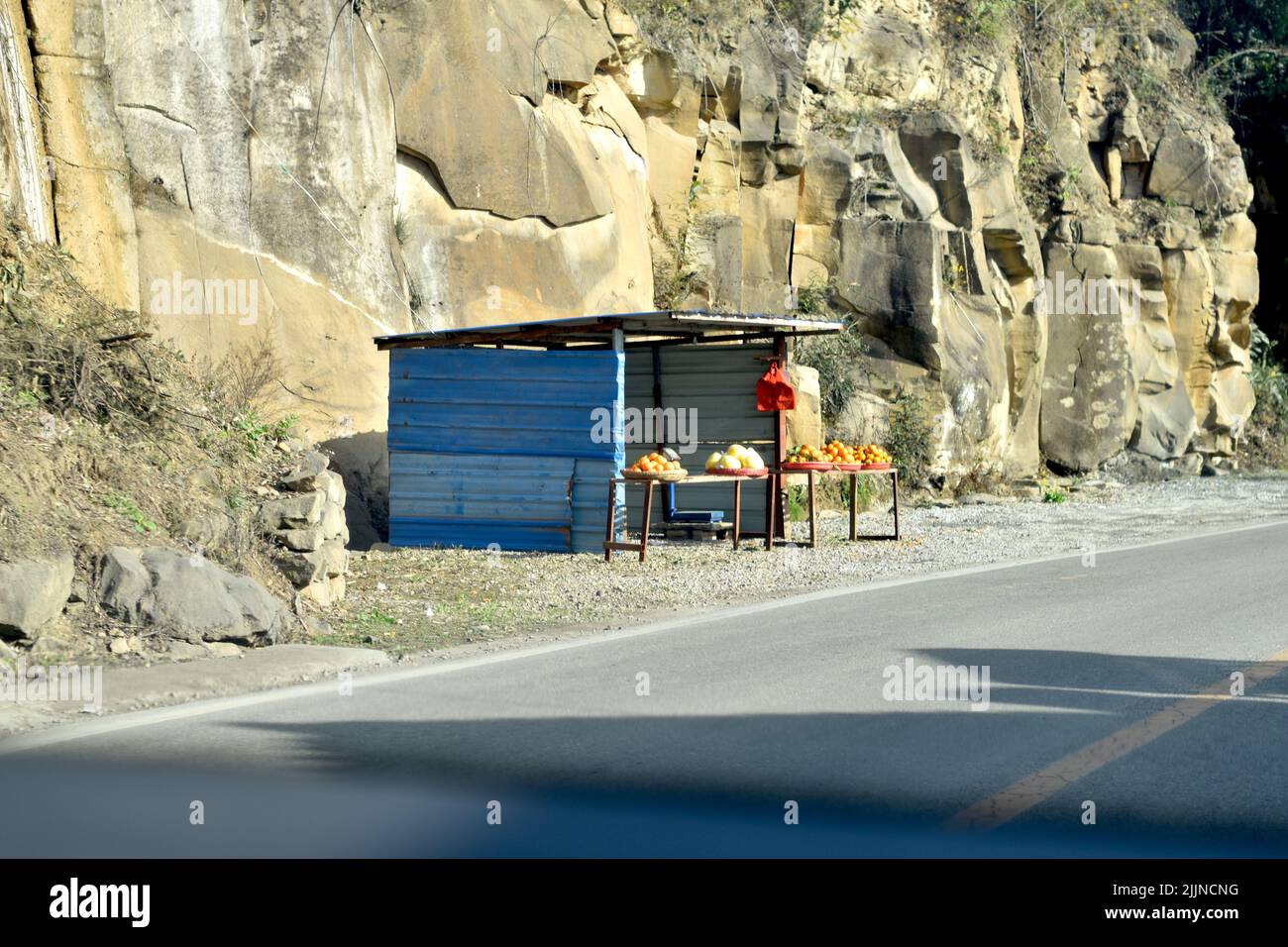 A small street market on the highway Stock Photo - Alamy