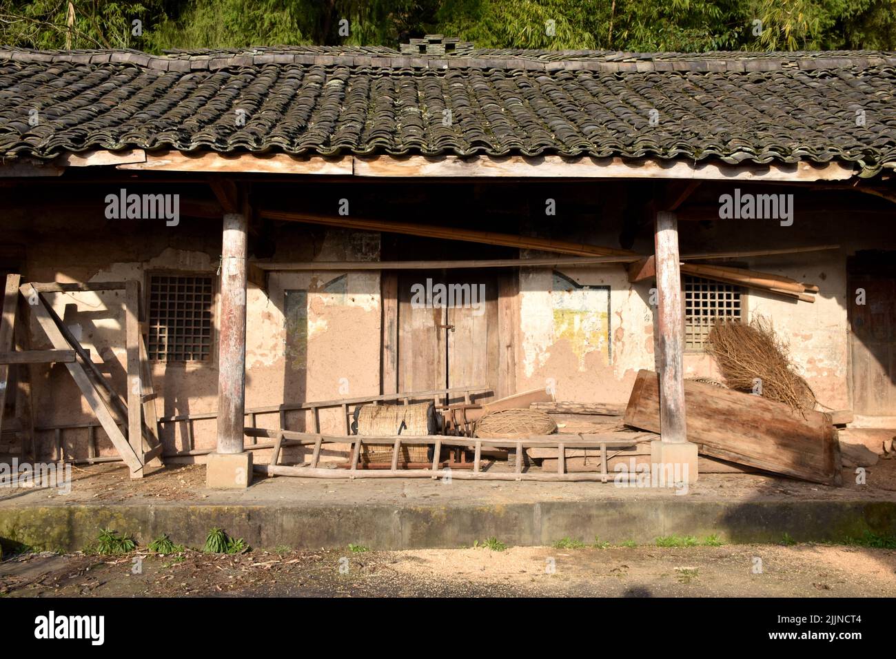 An old asian rural house in a village Stock Photo - Alamy