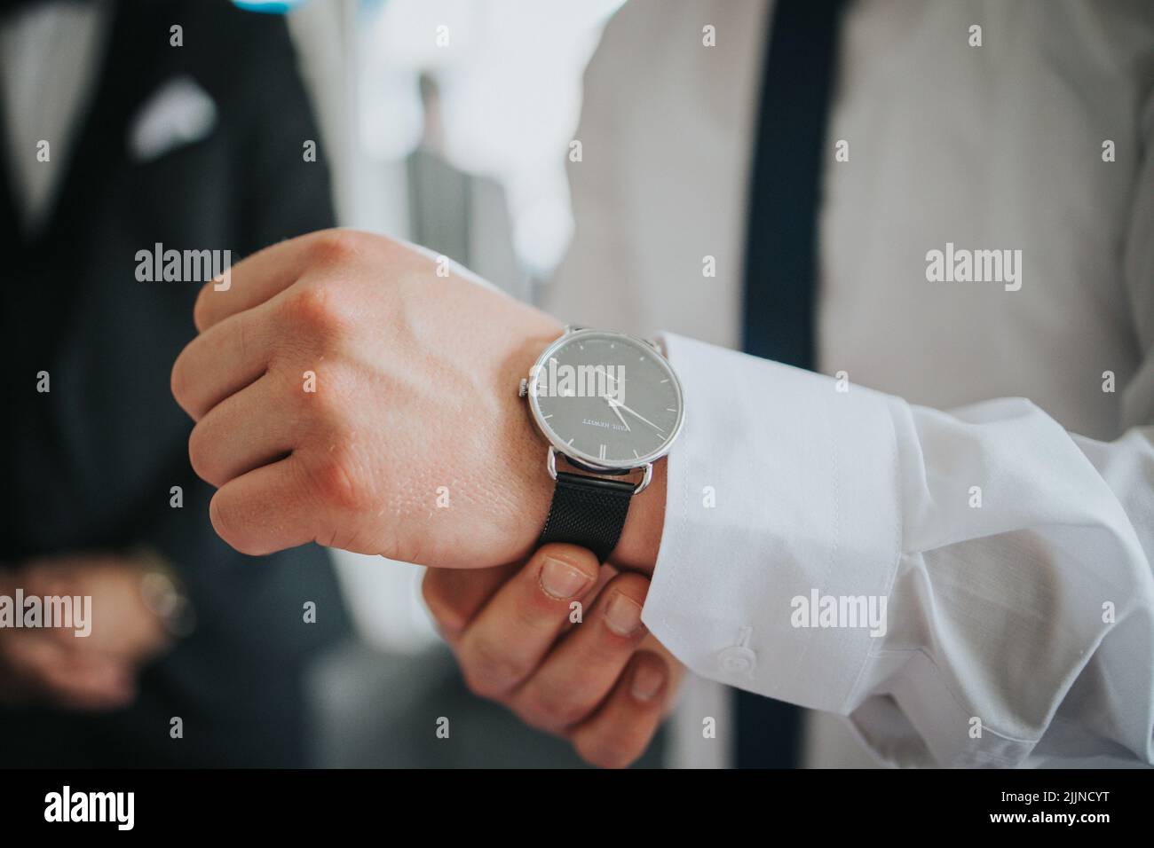 Man wearing watch hi-res stock photography and images - Alamy
