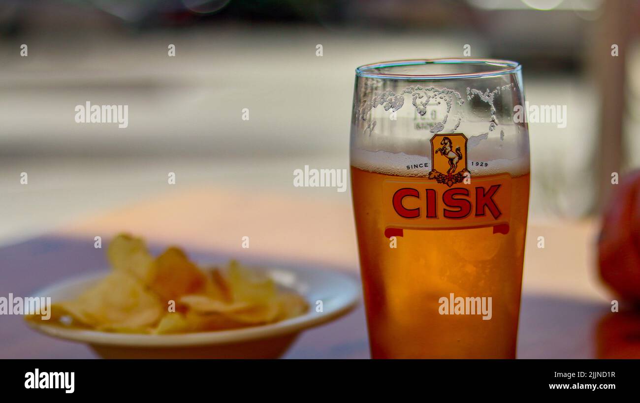 A closeup shot of a Poppy Village Beer in Marsaxlokk, Malta Stock Photo ...