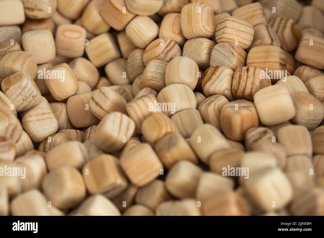 Lots of small wooden cubes. Background of wooden cubes Stock Photo - Alamy