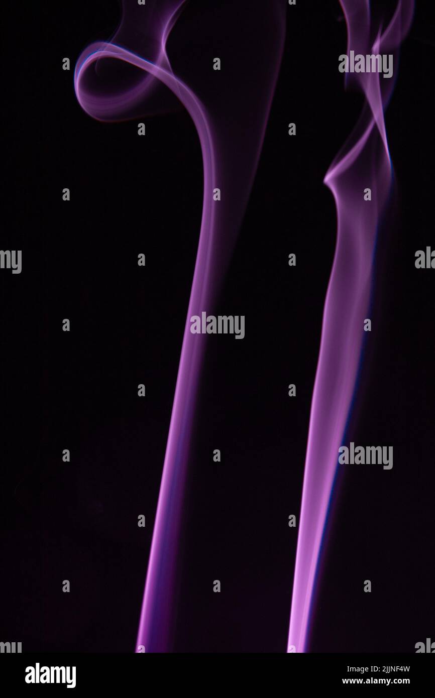 Real colorful smoke on black background Stock Photo - Alamy