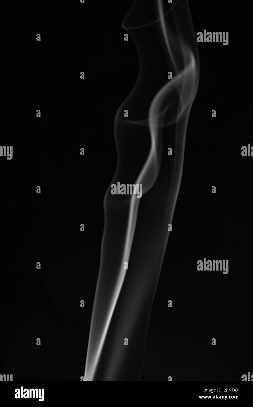 Real colorful smoke on black background Stock Photo - Alamy