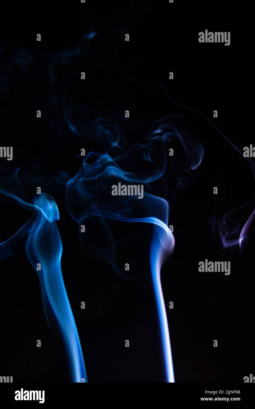 Real colorful smoke on black background Stock Photo - Alamy