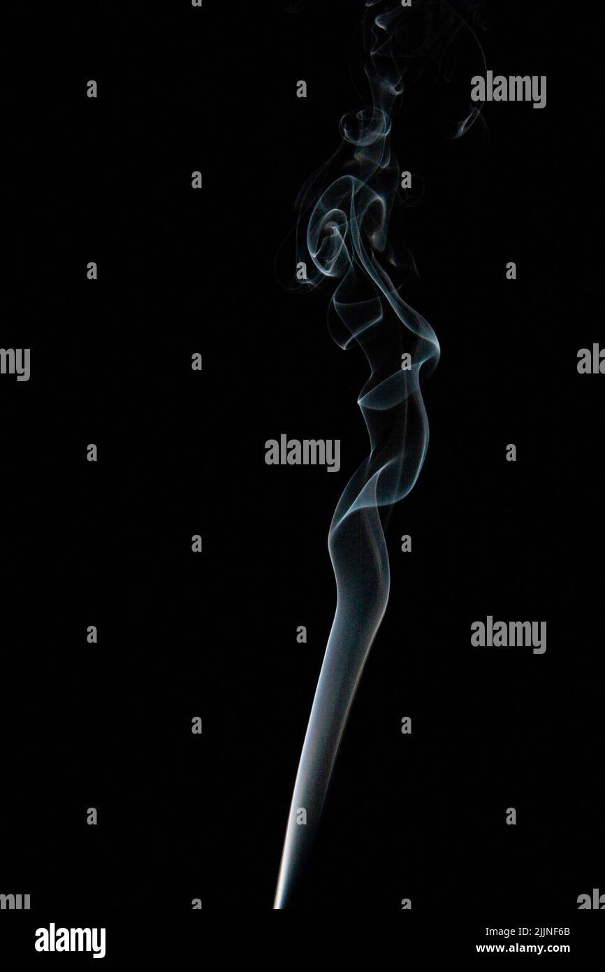 Real colorful smoke on black background Stock Photo - Alamy