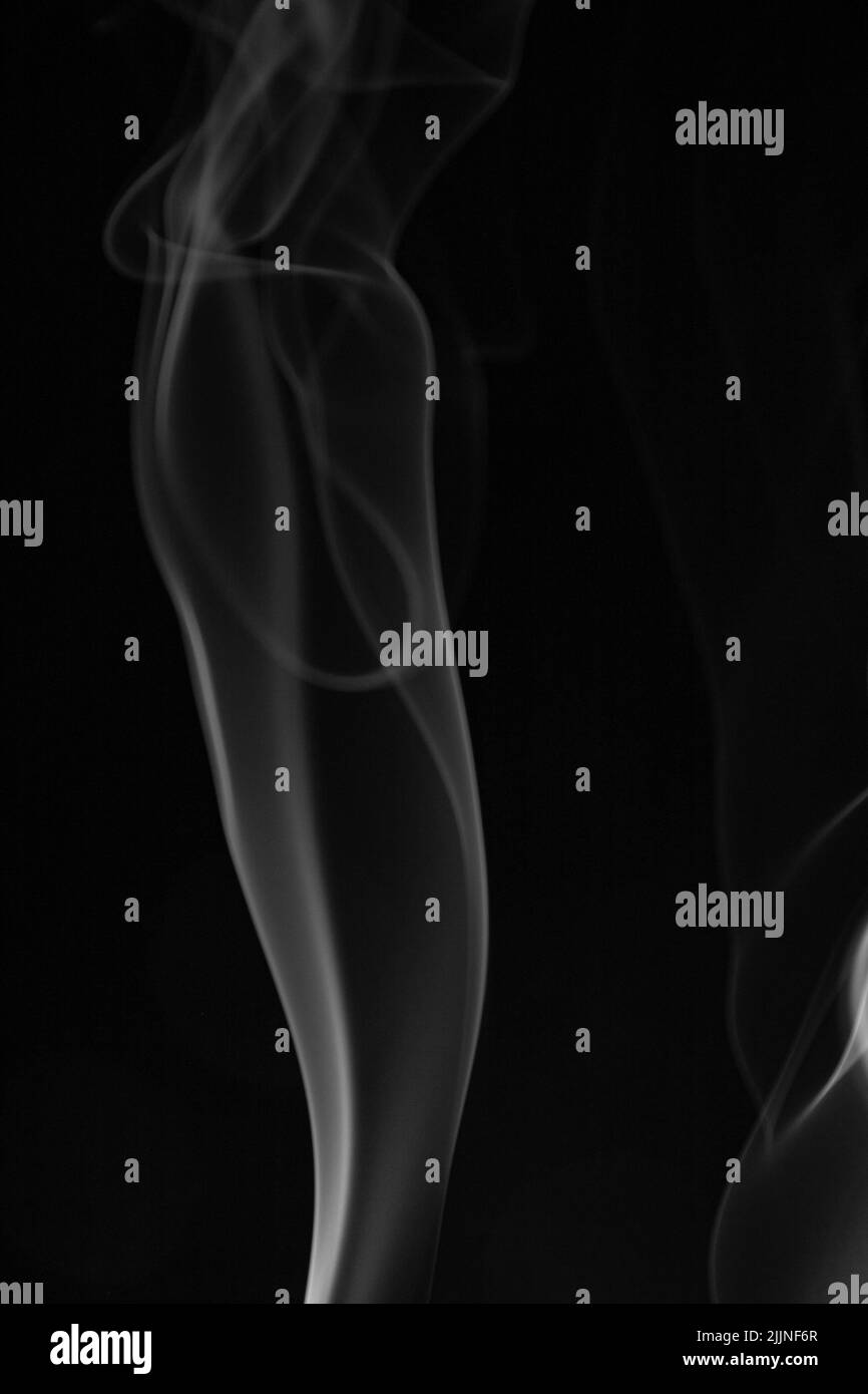 Real colorful smoke on black background Stock Photo - Alamy