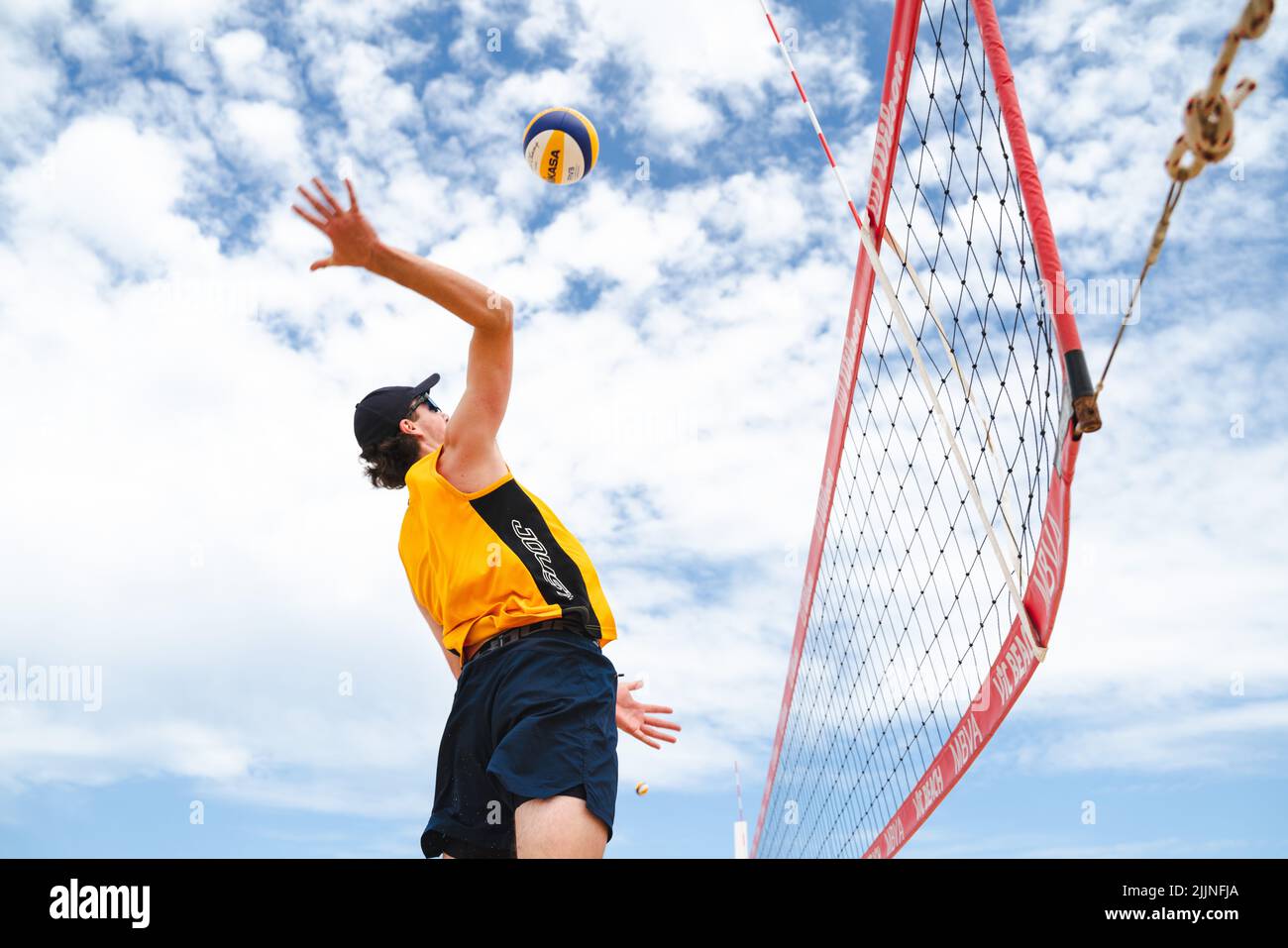 Male volleyball player jumping hi-res stock photography and images - Alamy