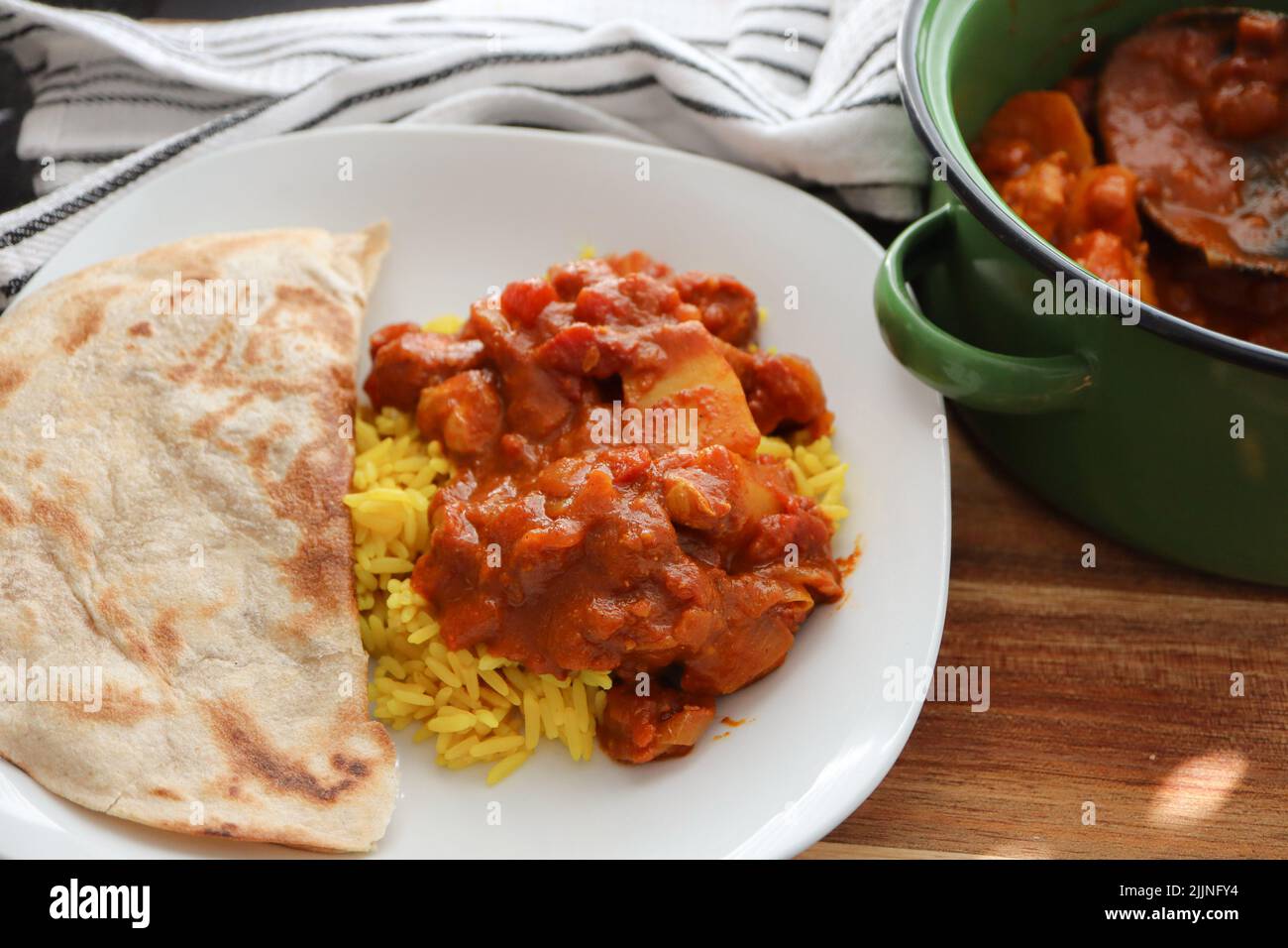Chicken curry turmeric rice hi-res stock photography and images - Alamy