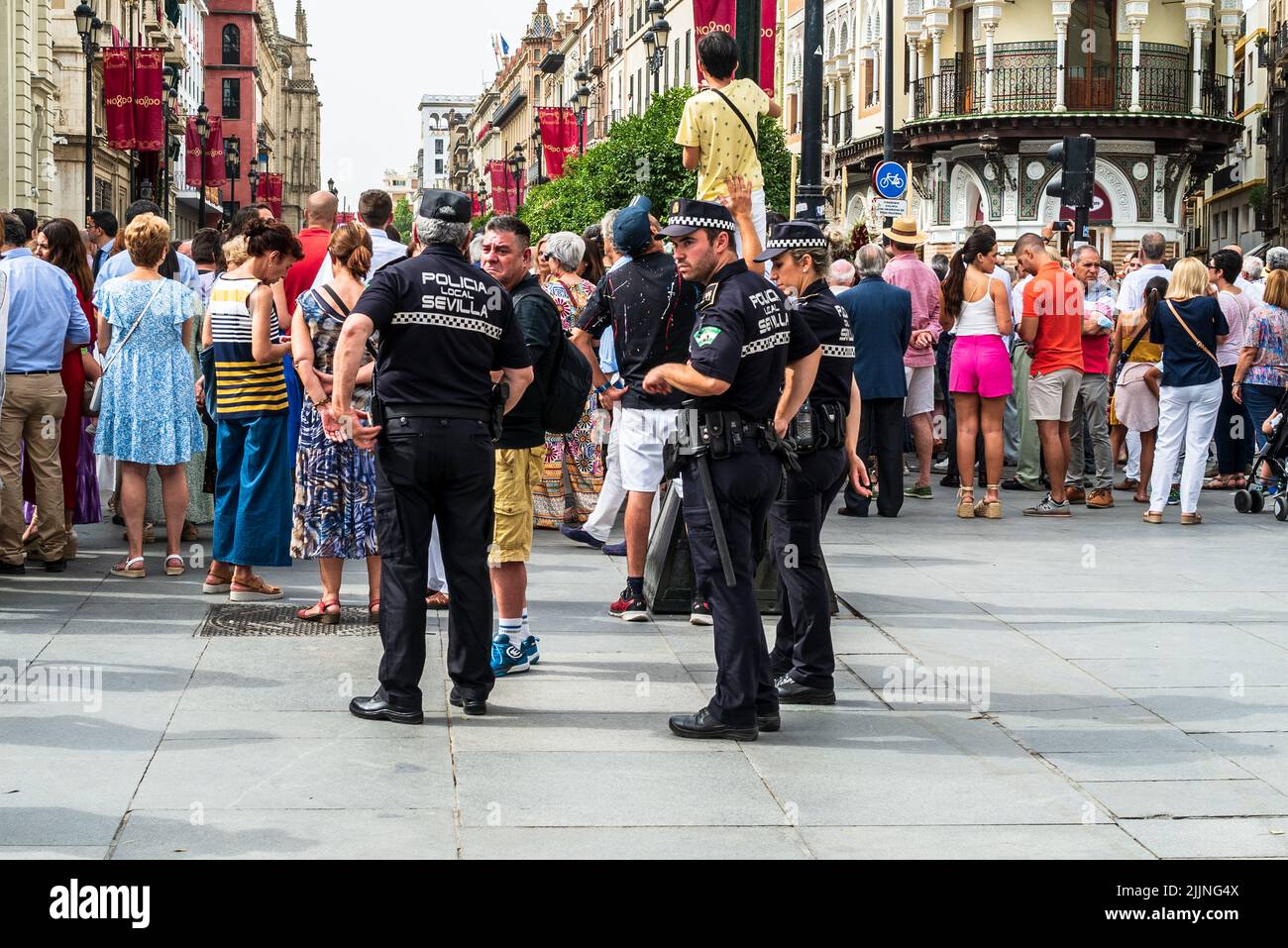 Seville, Spain -- June 6, 2022. Police Officers guard the route as ...
