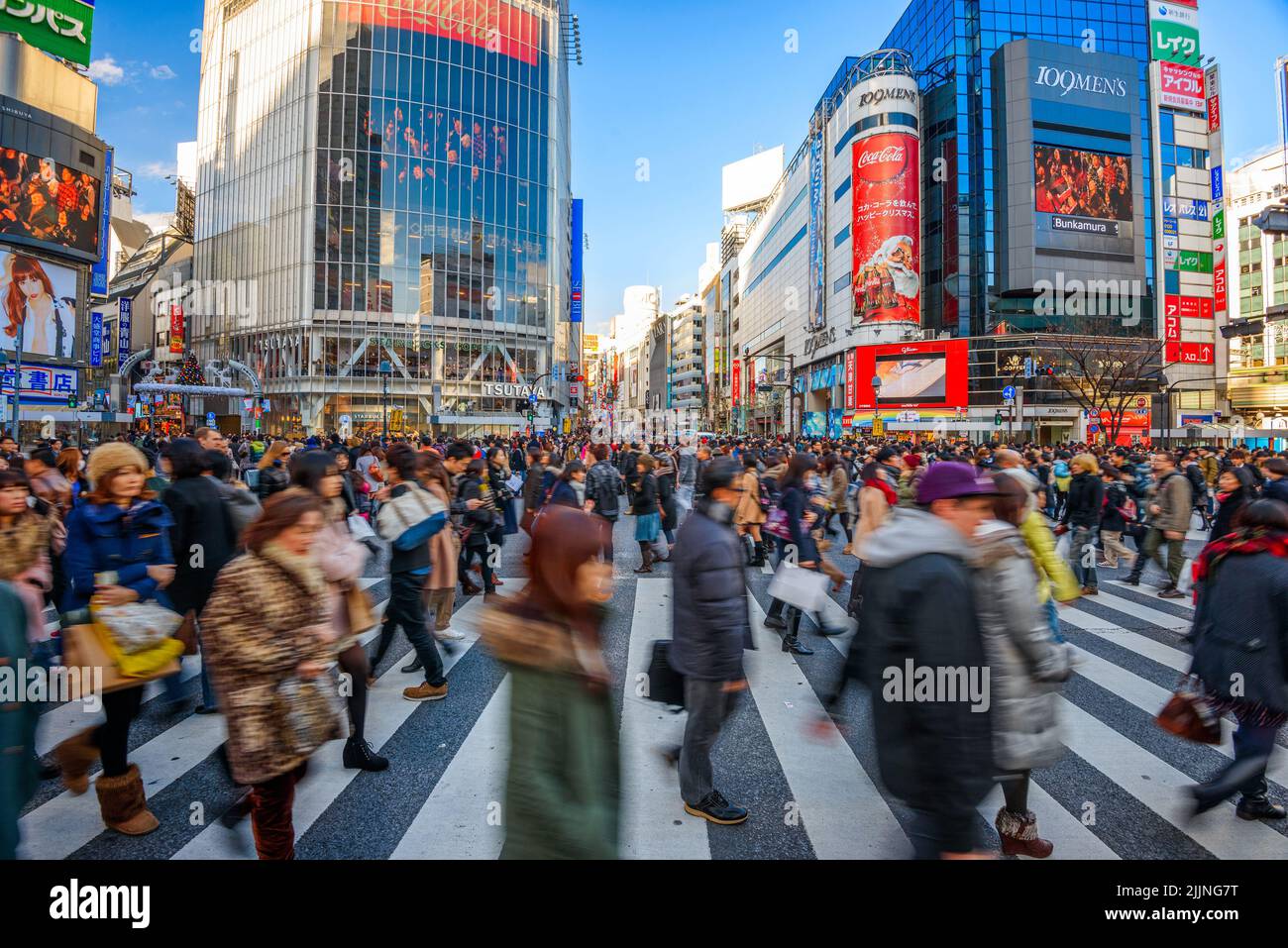 DECEMBER 24, 2012 - TOKYO, JAPAN: Pedestrians cross Shibuya Crossing ...