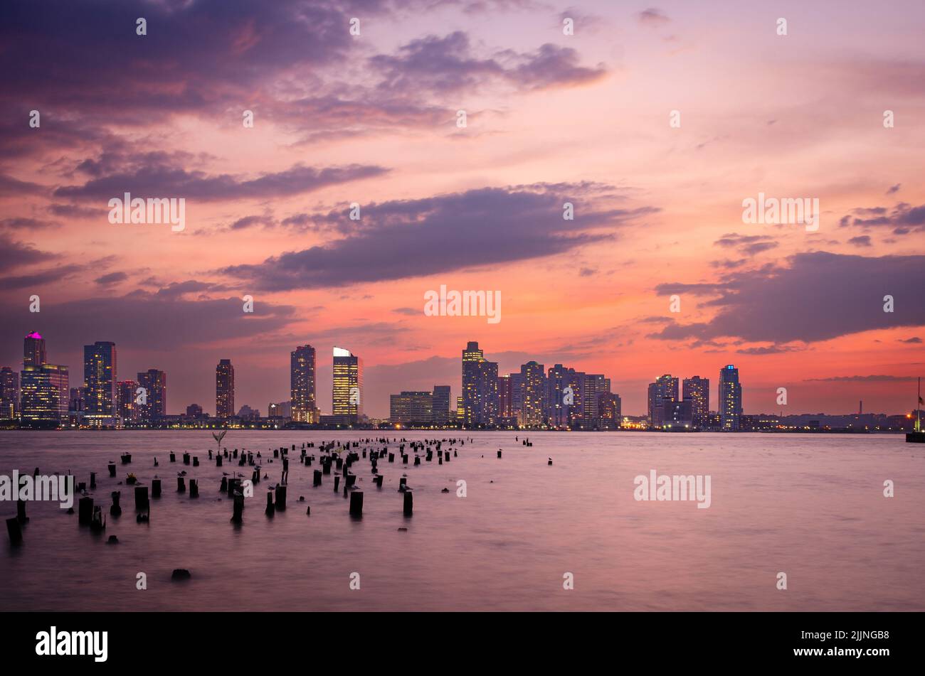 Exchange Place, New Jersey, USA skyline from across the Hudson River ...
