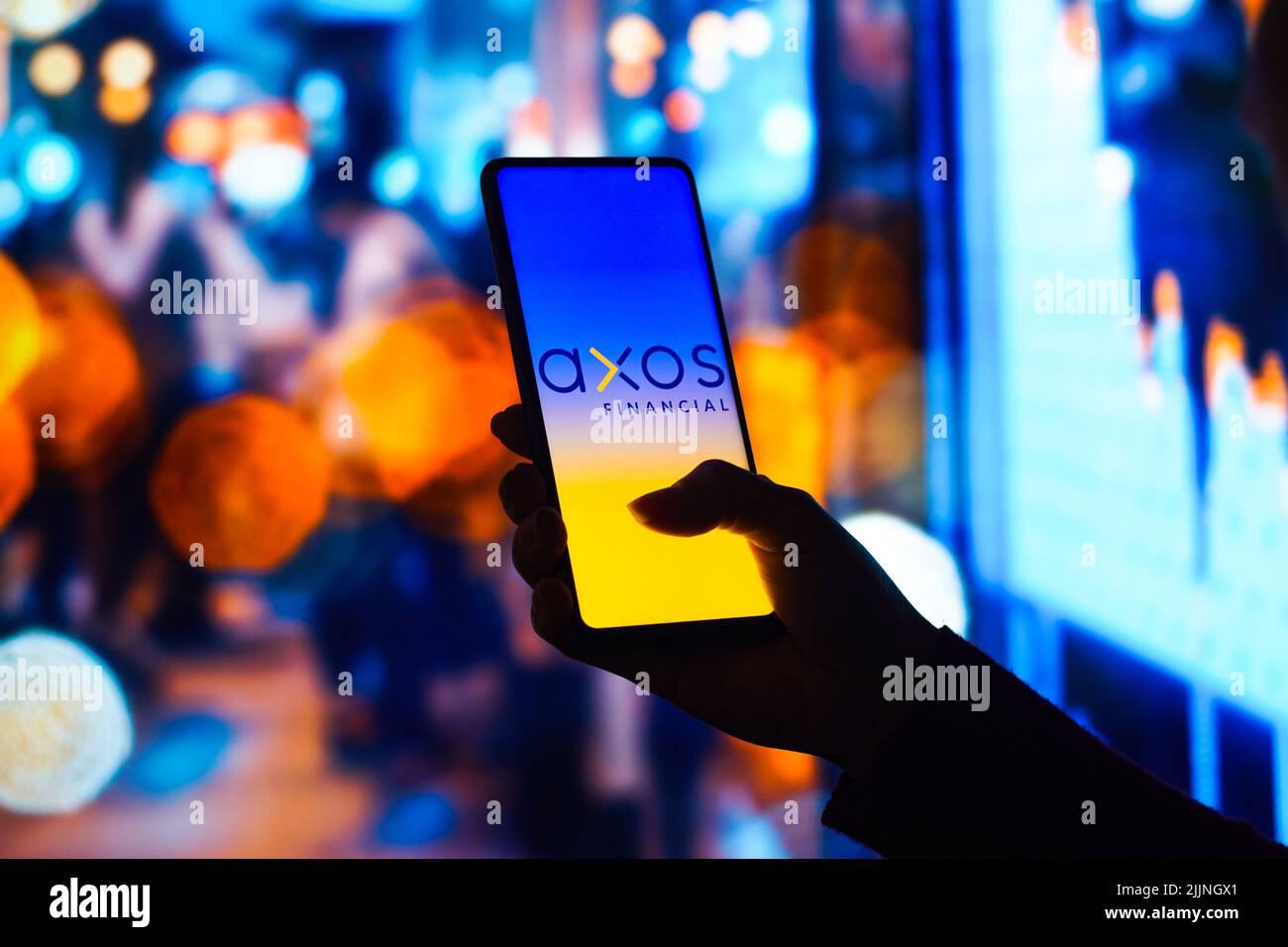 In this photo illustration, the Axos Financial logo is displayed on a ...